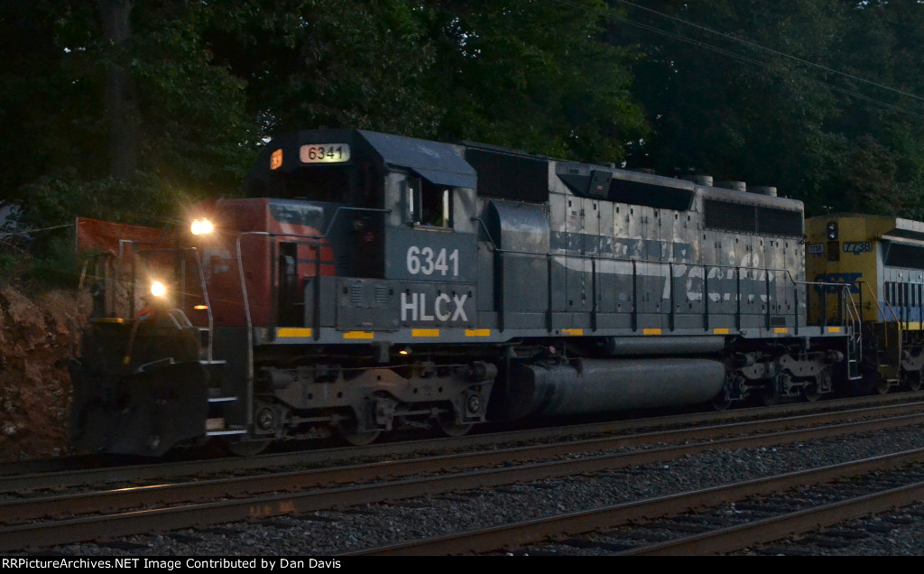 HLCX SD40-2 6341 "Southern Pacific" leads Q300-23